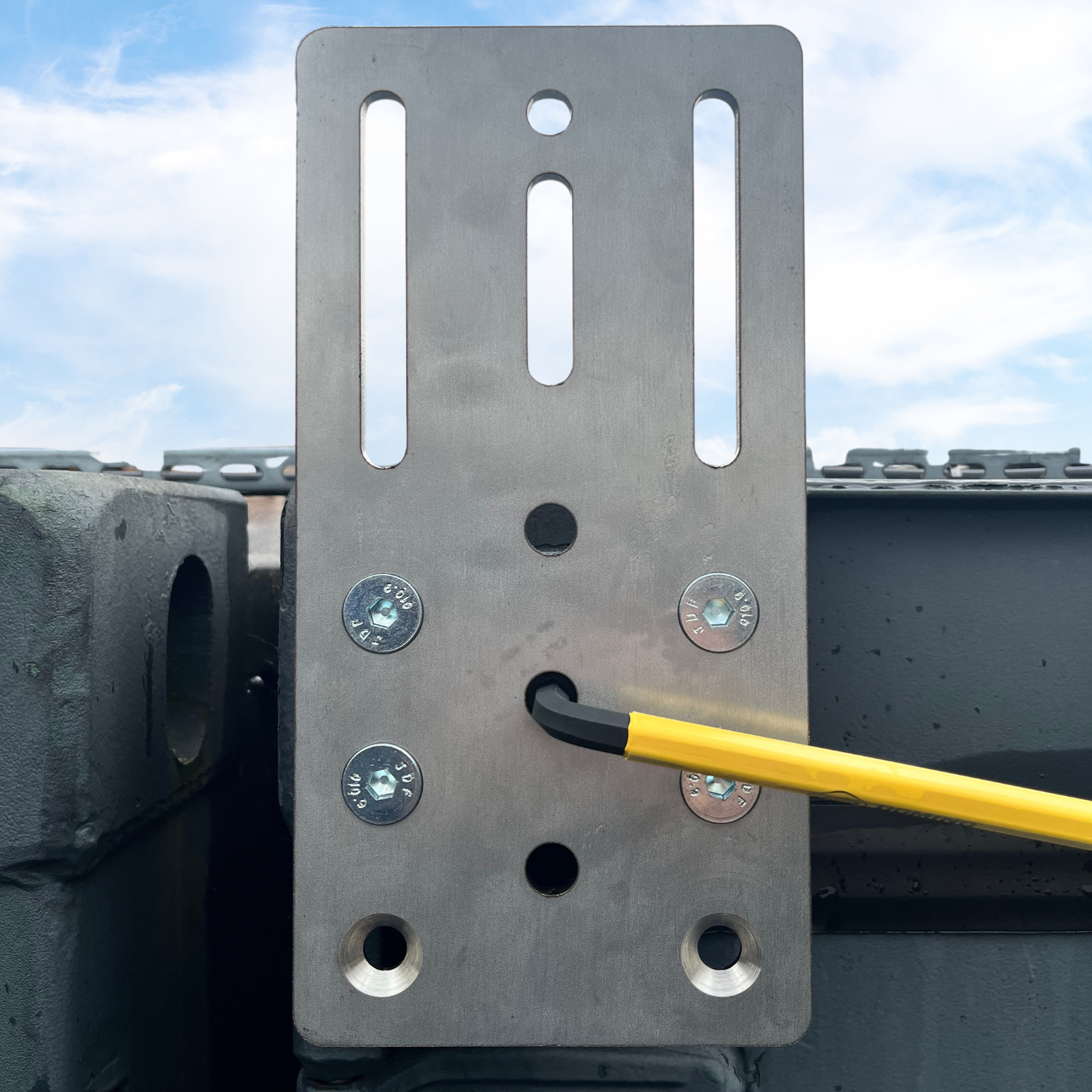 Attach almost anything to shipping containers. | Domino Clamps